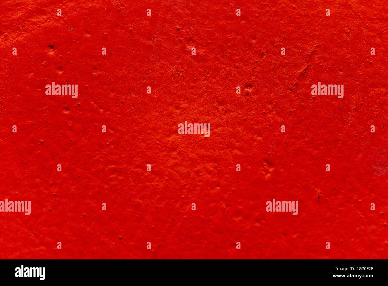 Grain red dribbled paint wall background or texture. Wide Background ...
