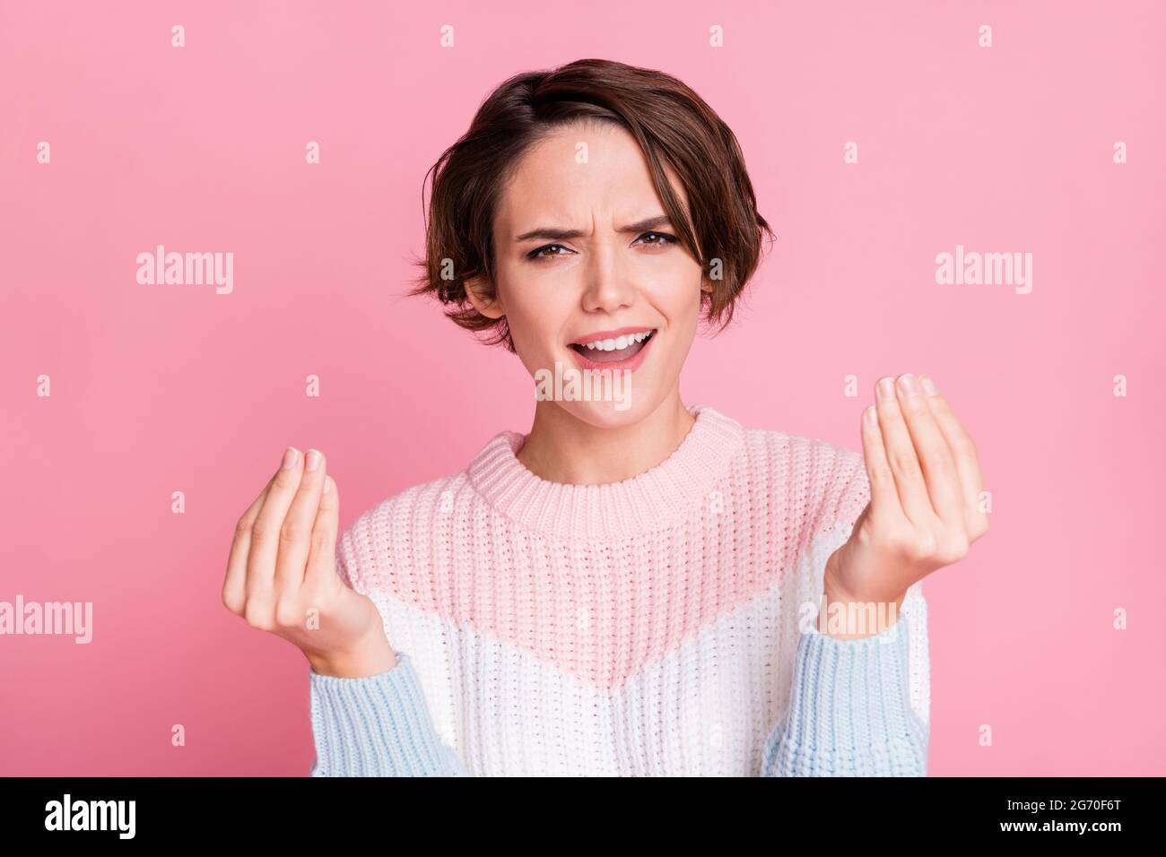 Photo of unsatisfied young lady grimace face arms fingers show symbol ...