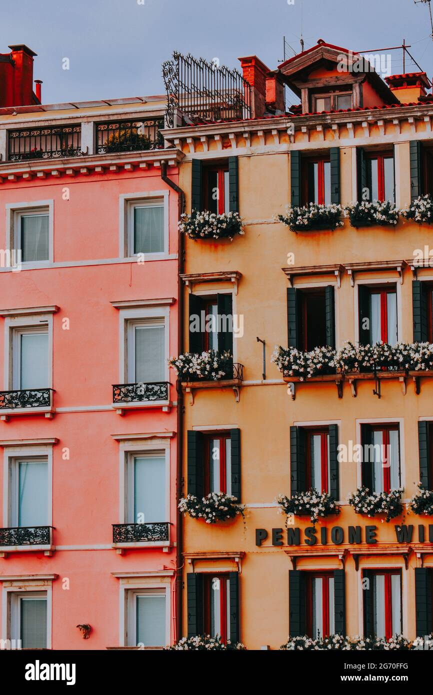 Beautiful red medieval building with balconies Stock Photo - Alamy