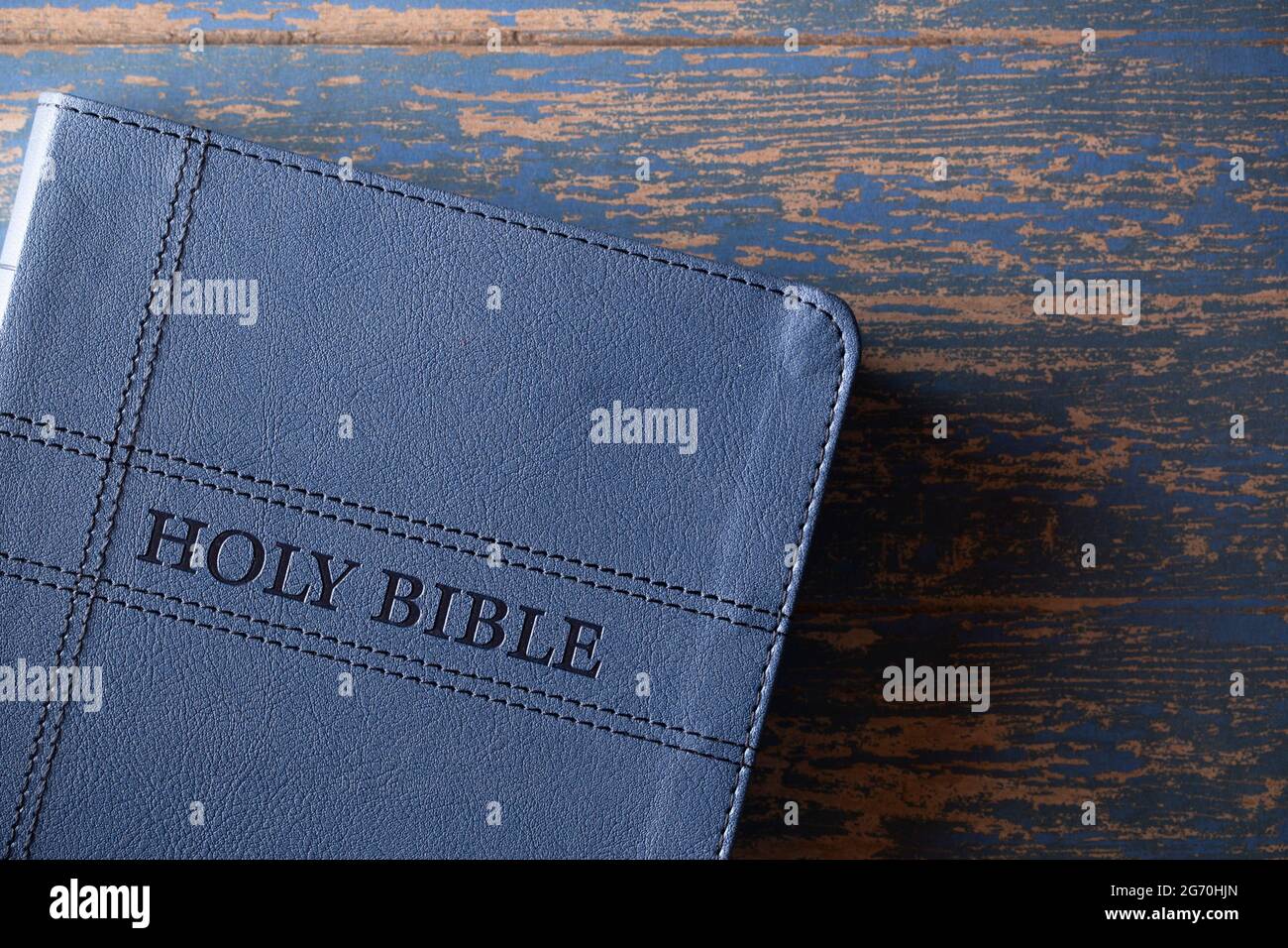 The Holy Bible on a Rustic Wooden Table Stock Photo - Alamy