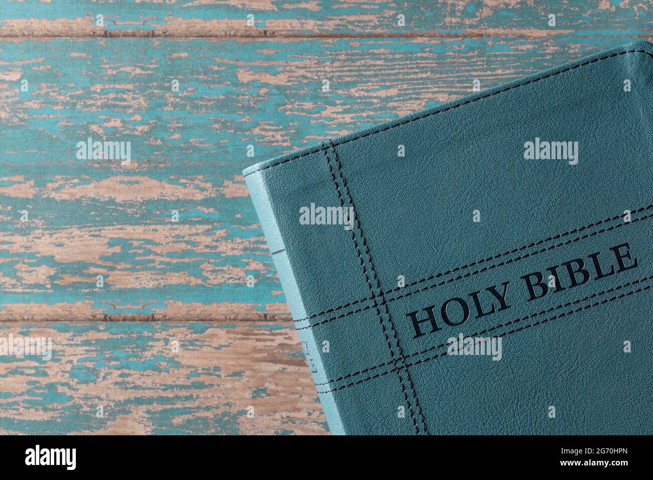 The Holy Bible on a Rustic Wooden Table Stock Photo - Alamy