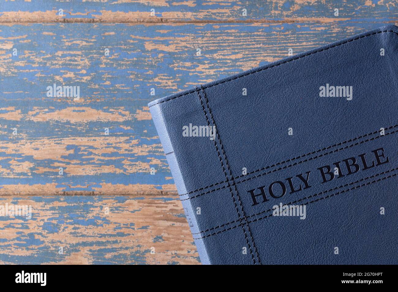 The Holy Bible on a Rustic Wooden Table Stock Photo - Alamy