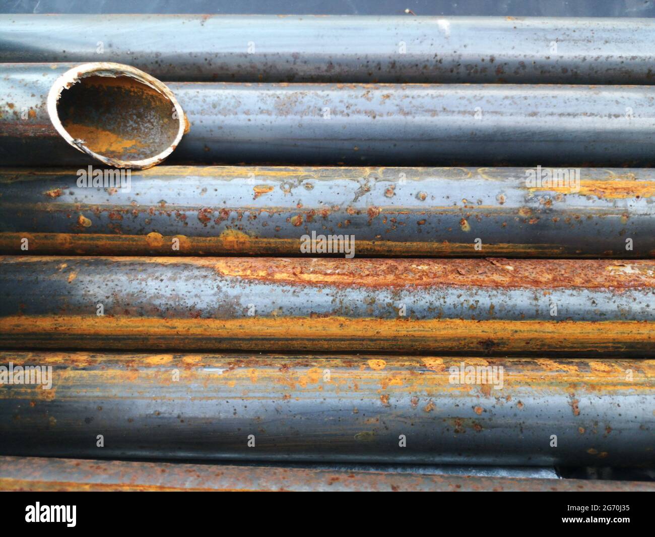 Closeup image of rusty metal pipes Stock Photo - Alamy