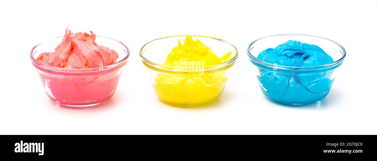 Bowls of Primary Colored Icing Mixed withed with Gel Food Coloring ...