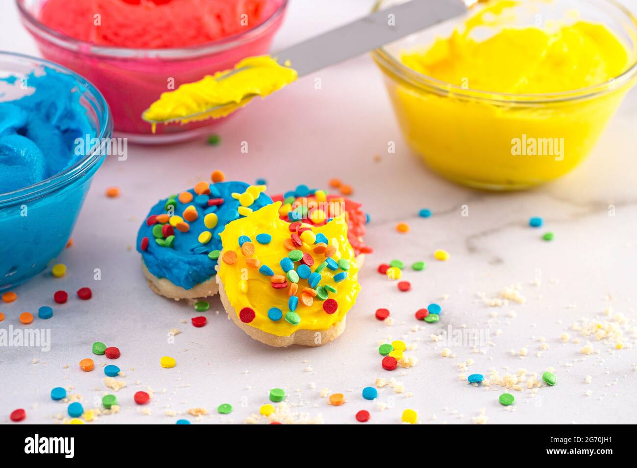 Cookies Decorated with Bright Primary Colored Frosting with Rainbow ...