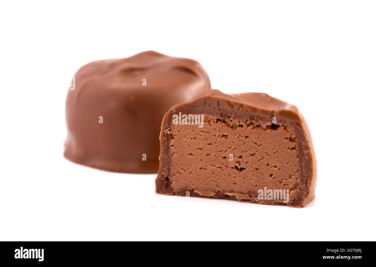 A Chocolate Fudge Truffle Cut Open and Isolated on a White Background ...