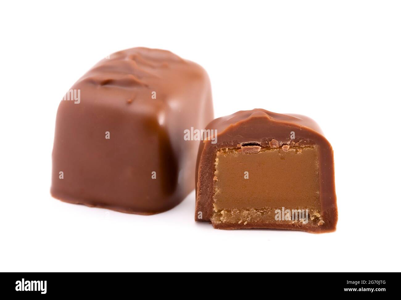 A Chocolate Caramel Truffle Cut Open and Isolated on a White Background ...