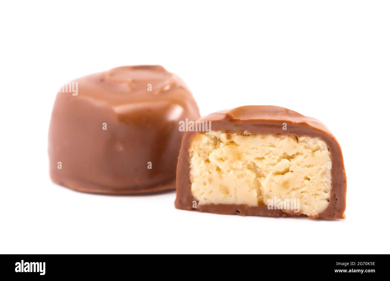 A Chocolate Cream Truffle Cut Open and Isolated on a White Background ...