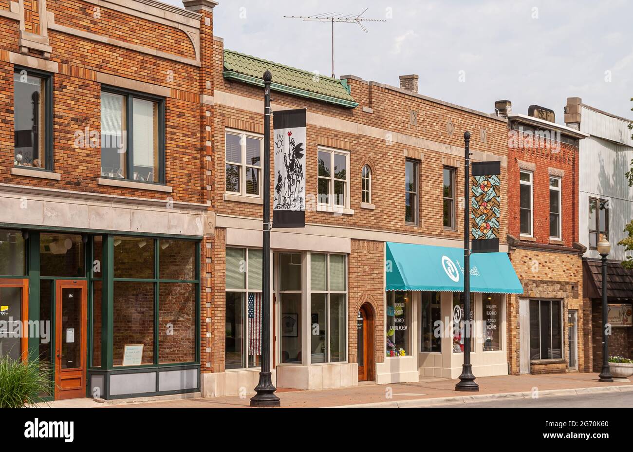 Holland, MI, USA - June 8, 2008: Historic district. Row of small red ...