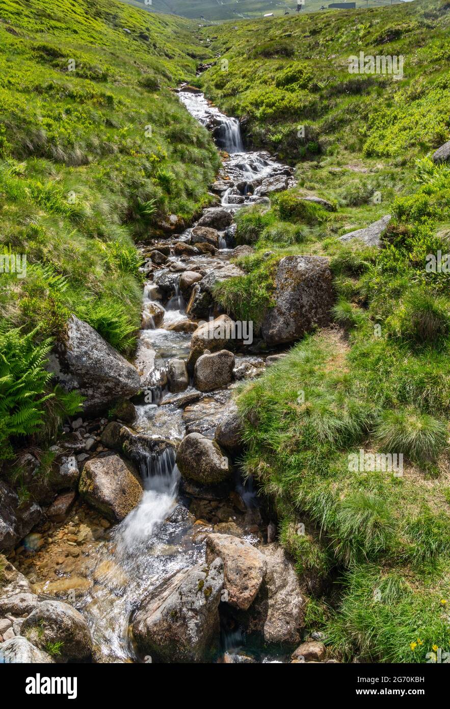 Water flowing over rocks in a mountain stream Stock Photo - Alamy