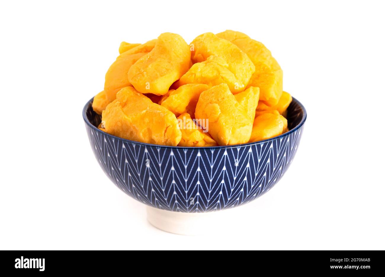 A Bowl of Cheddar Cheese Curds Isolated on a White Background Stock ...