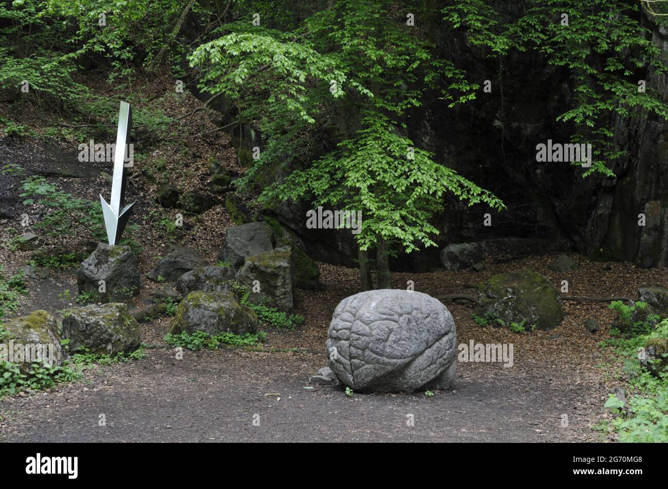 Stone memorial that looks like a human brain in the forest Stock Photo ...