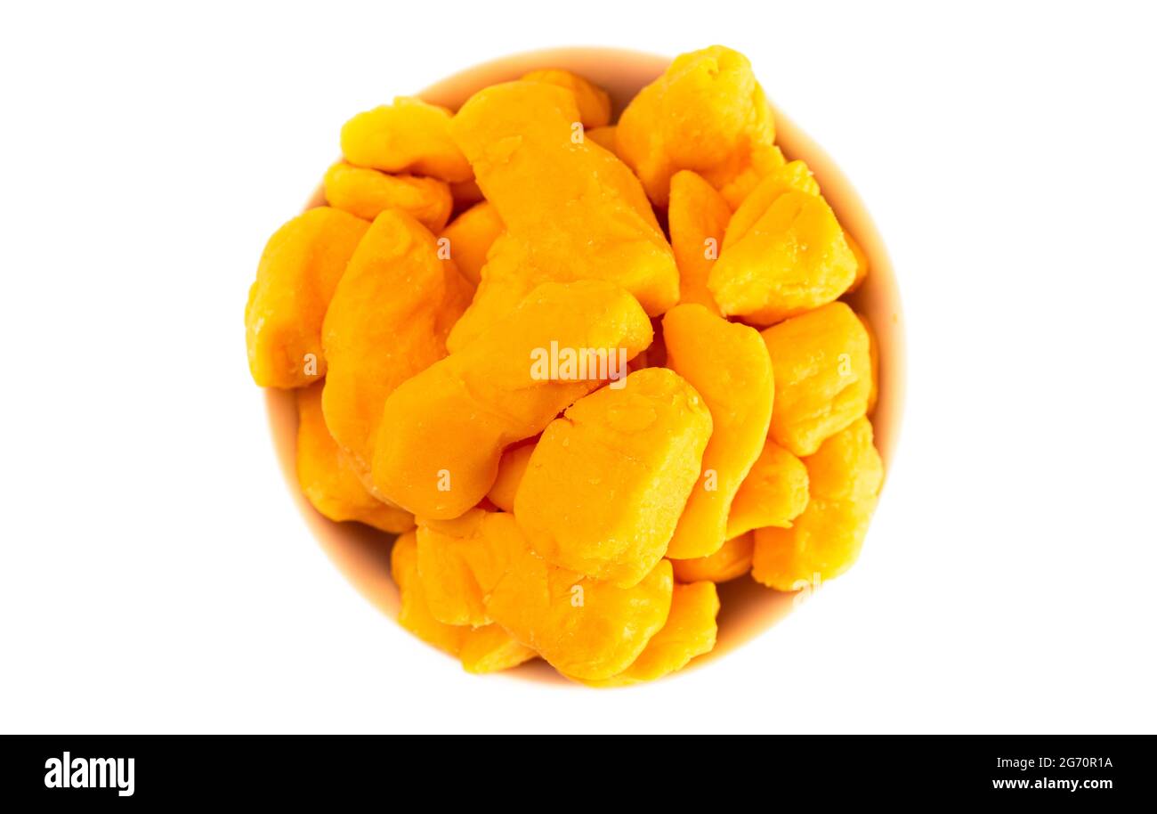 A Bowl of Cheddar Cheese Curds Isolated on a White Background Stock ...
