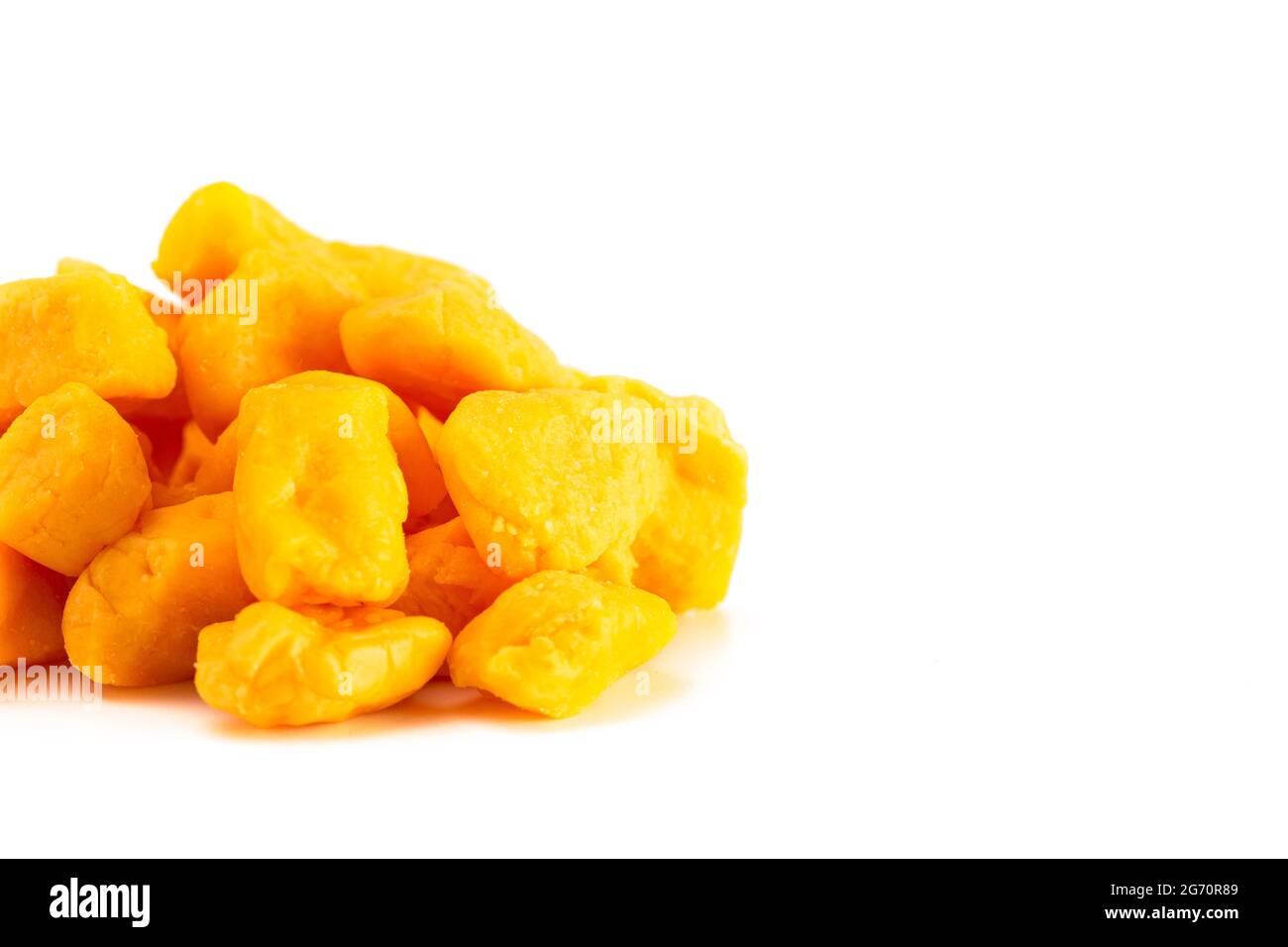 A Pile of Cheddar Cheese Curds Isolated on a White Background Stock ...