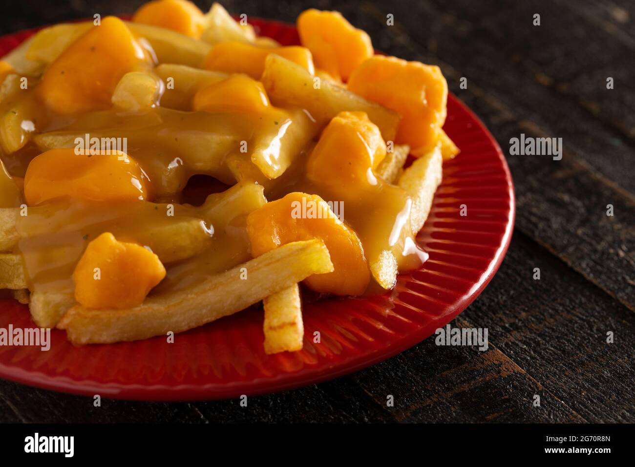 French fries cheese curds brown gravy poutine hi-res stock photography ...