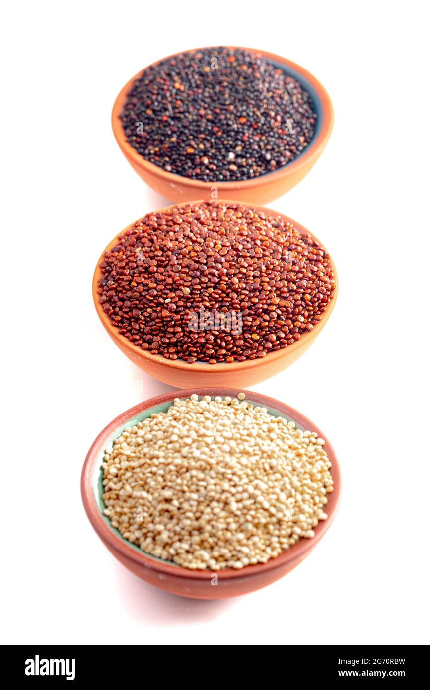 Three Bowls of Quinoa Varieties Isolated on a White Background Stock ...
