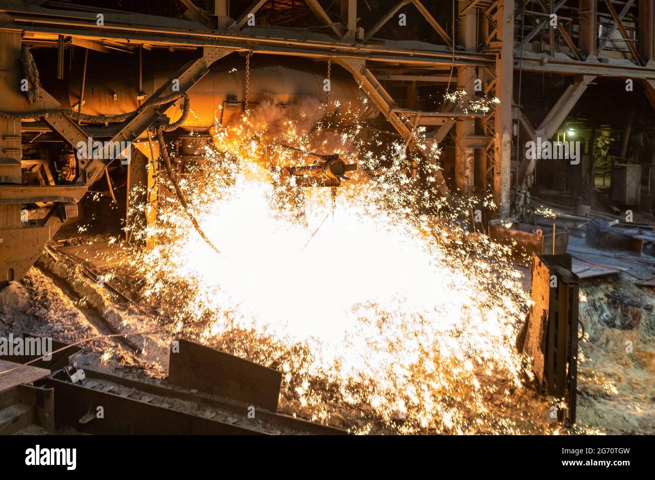 Blast furnace, cast iron production. Metal poured out of the ...