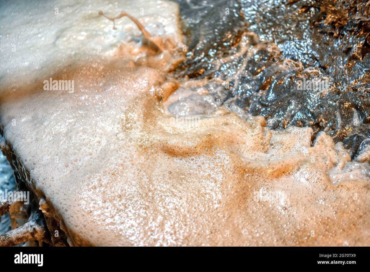 Industrial flotation process. Shooting close-up. Fluid flow and foam ...