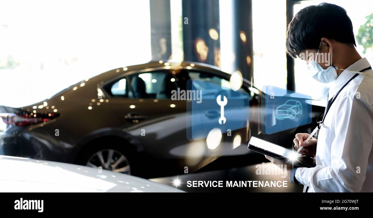 Asian Man mechanic inspection writing tablet. car for service ...