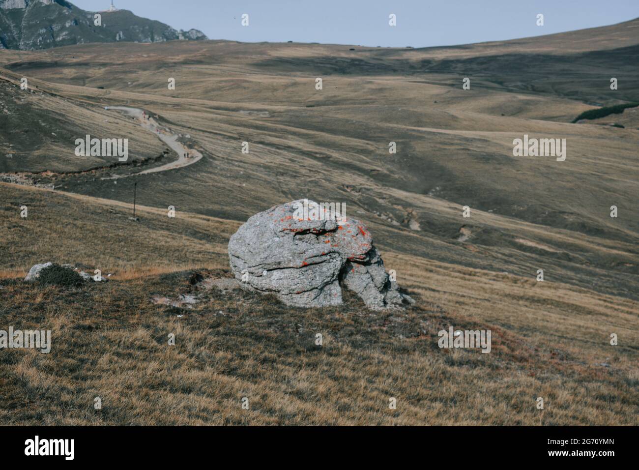 Rock in a mountain valley Stock Photo - Alamy