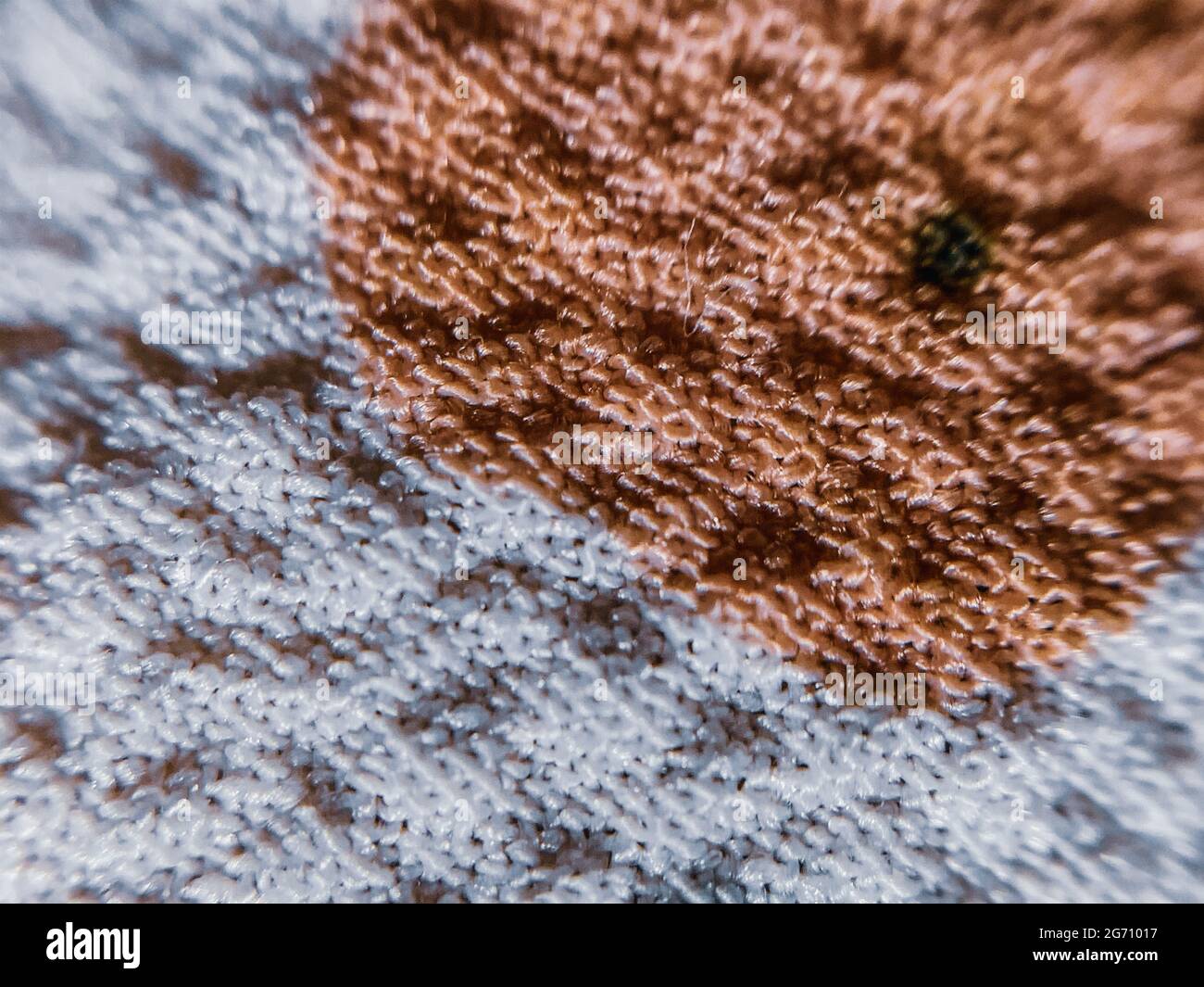 Closeup of fabric with orange patterns Stock Photo - Alamy