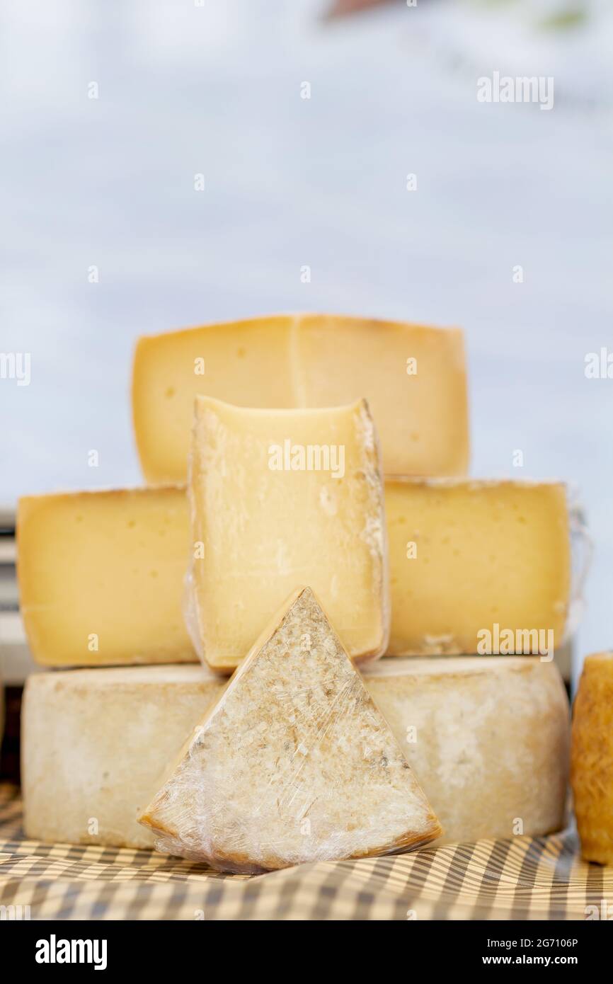 Pieces of cheese put together. Yellow cheese pieces placed on each ...