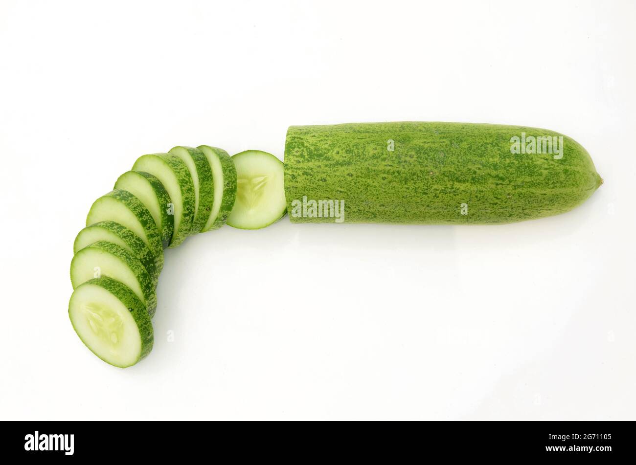 Closeup of sliced green ripe cucumber isolated on white background ...