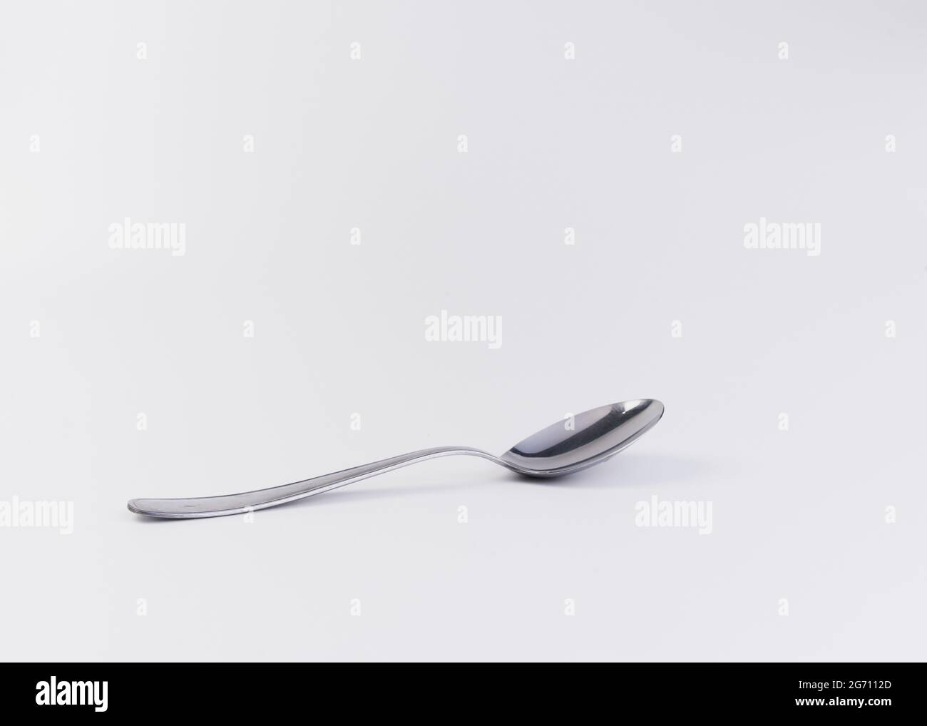 Spoon isolated on a white background Stock Photo - Alamy