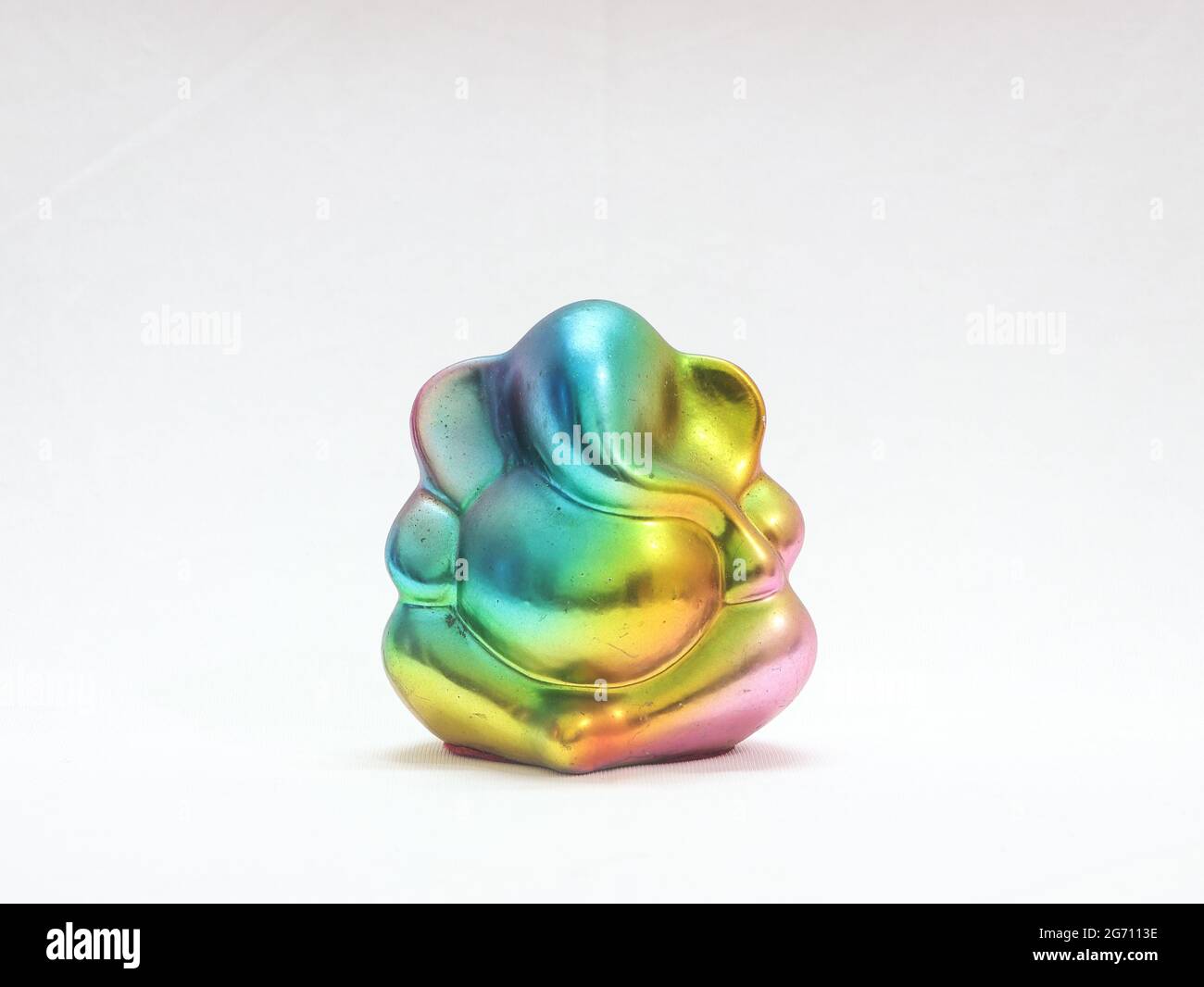 Hindu god lord ganesh rainbow statue isolated on a white background ...