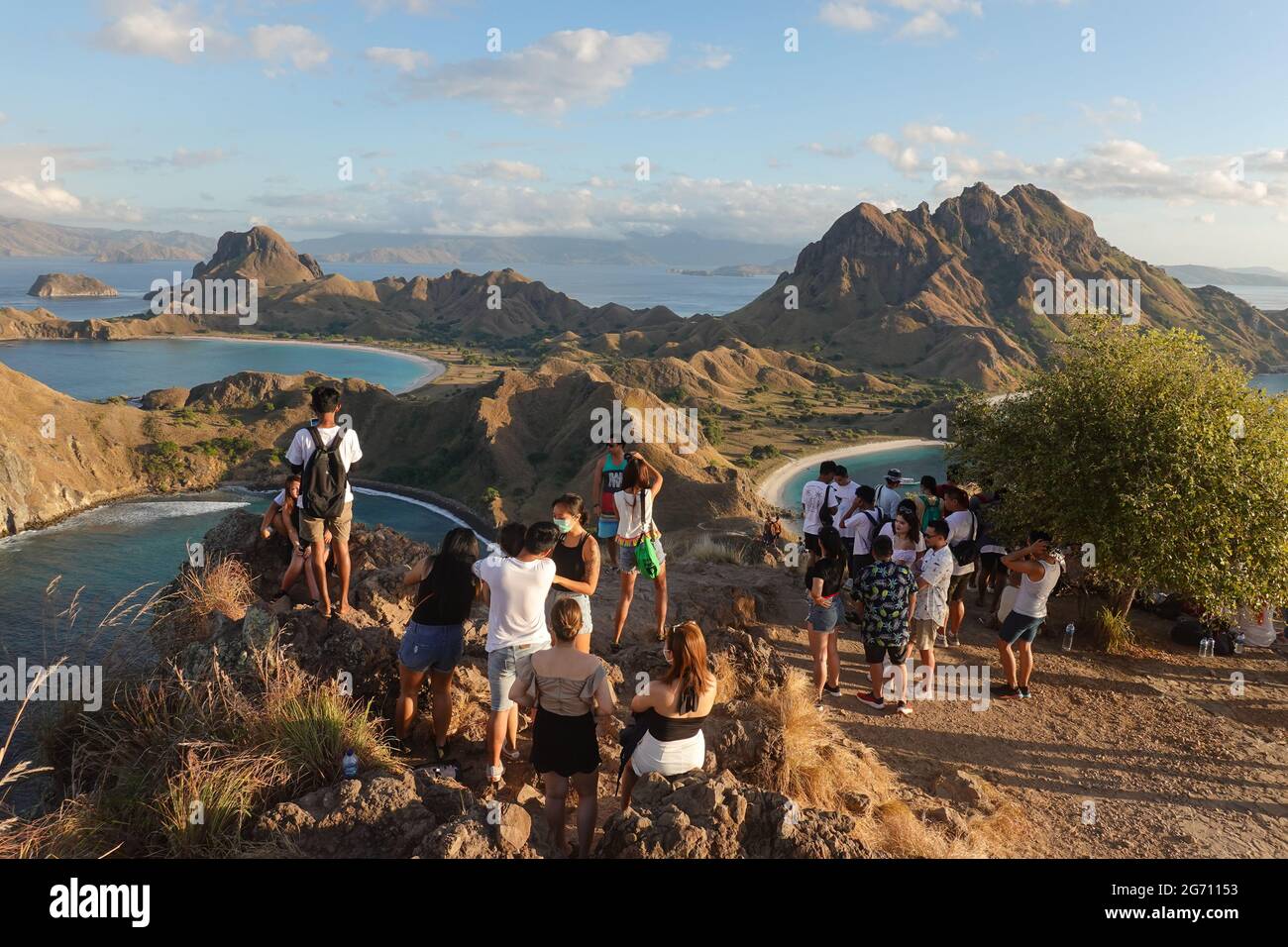 Padar, Indonesia - July 3 2021: A large group of Indonesian tourists ...
