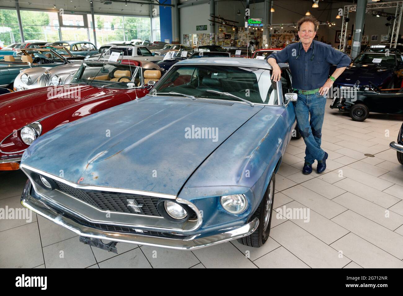 Mettmann, Germany. 09th July, 2021. Classic car dealer Michael Fröhlich ...