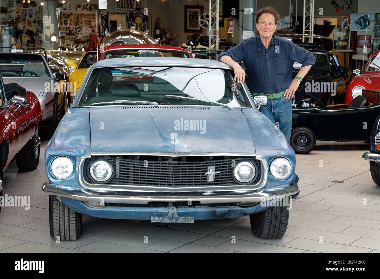Mettmann, Germany. 09th July, 2021. Classic car dealer Michael Fröhlich ...