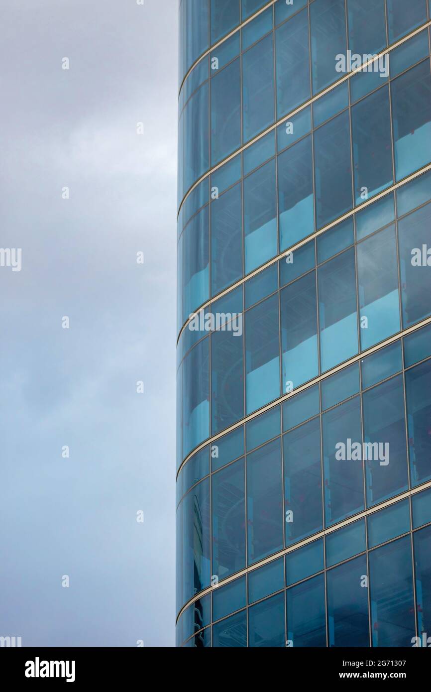 Vertical low angle view of windows of a high rise office building on a ...