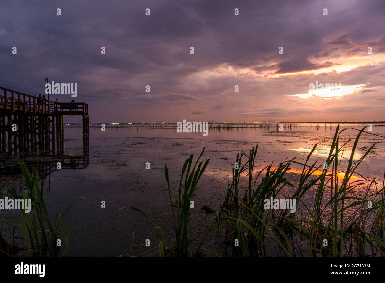Mobile Bay pier at sunset in July of 2021 Stock Photo - Alamy