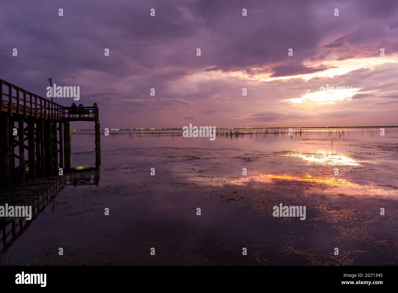 Mobile Bay pier at sunset in July of 2021 Stock Photo - Alamy