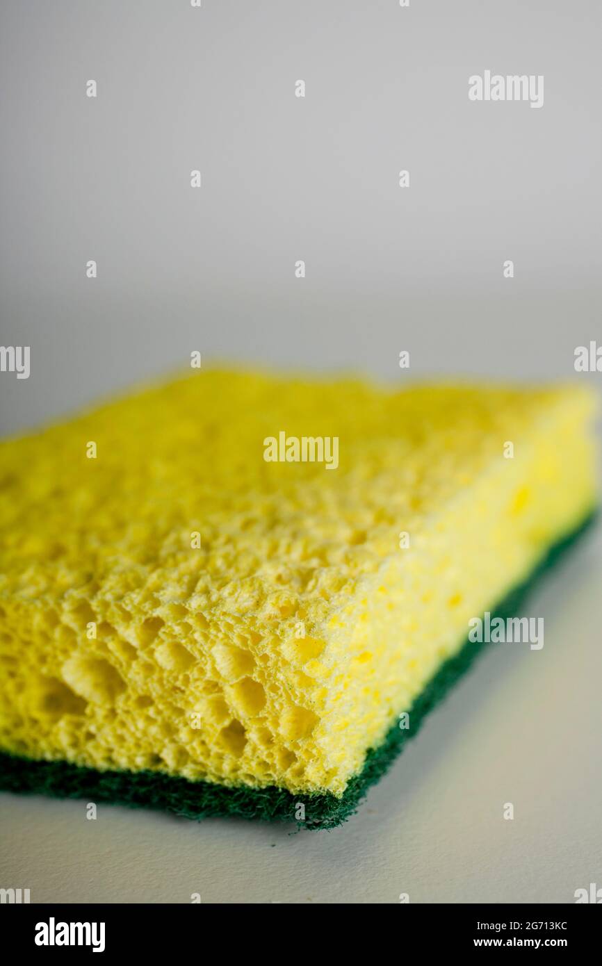 yellow kitchen sponge close up detail Stock Photo - Alamy