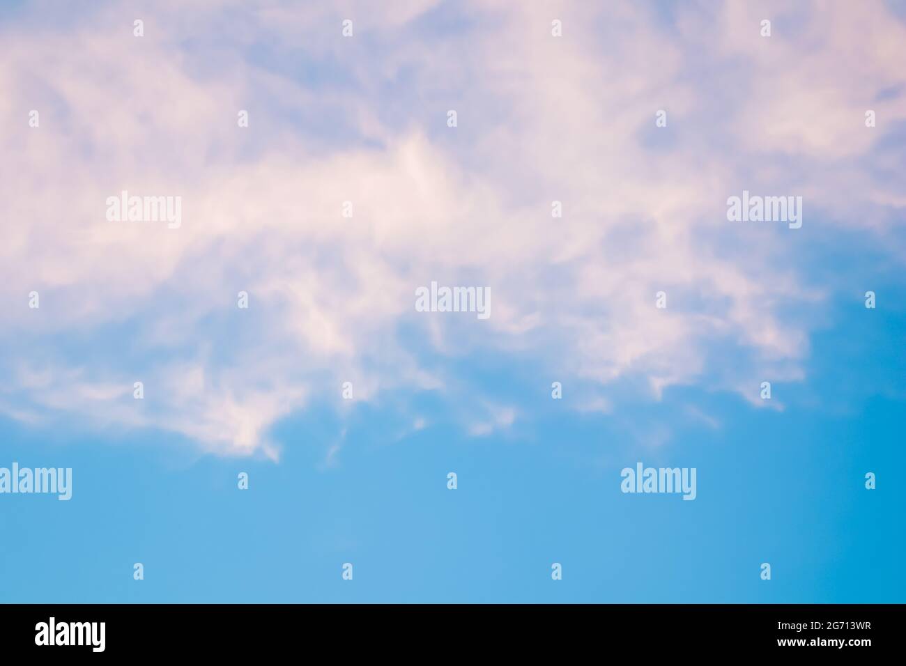 Background of blue sky with white and pink clouds in sunset Stock Photo ...