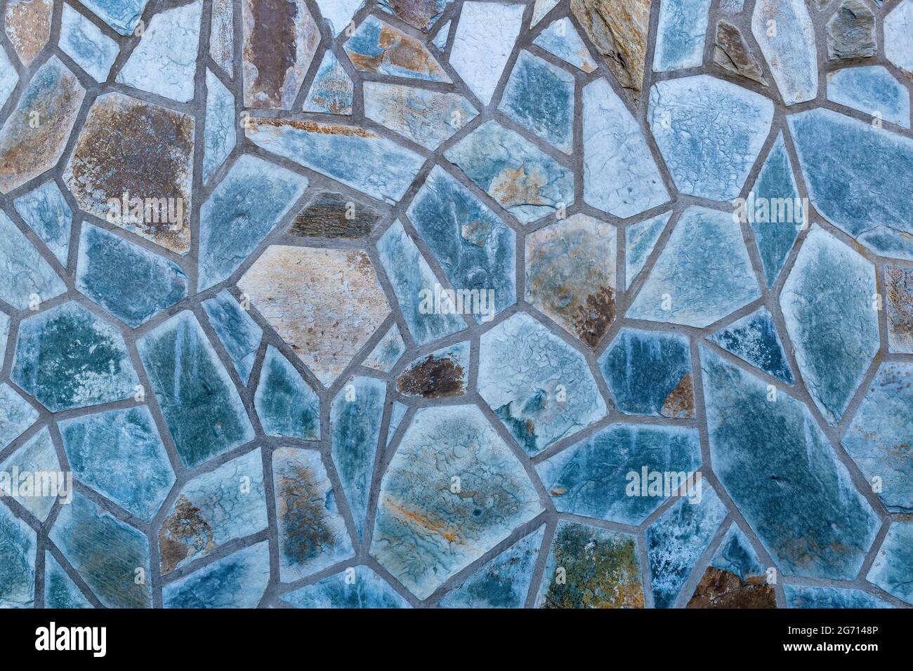 Blue glass surface partitioned into different shapes Stock Photo - Alamy