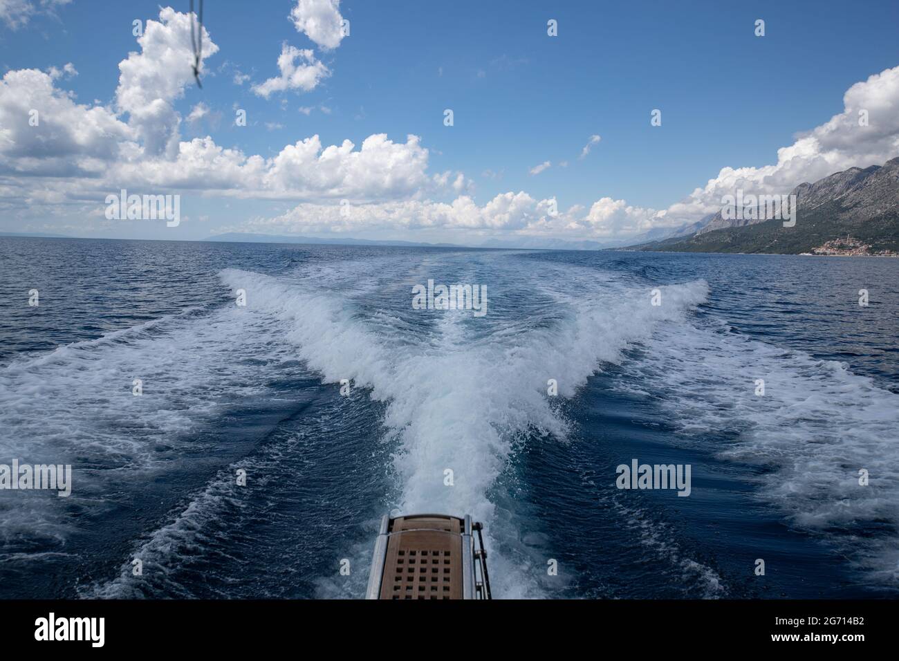 Beautiful waves created by the speed of the boat running on the beach ...