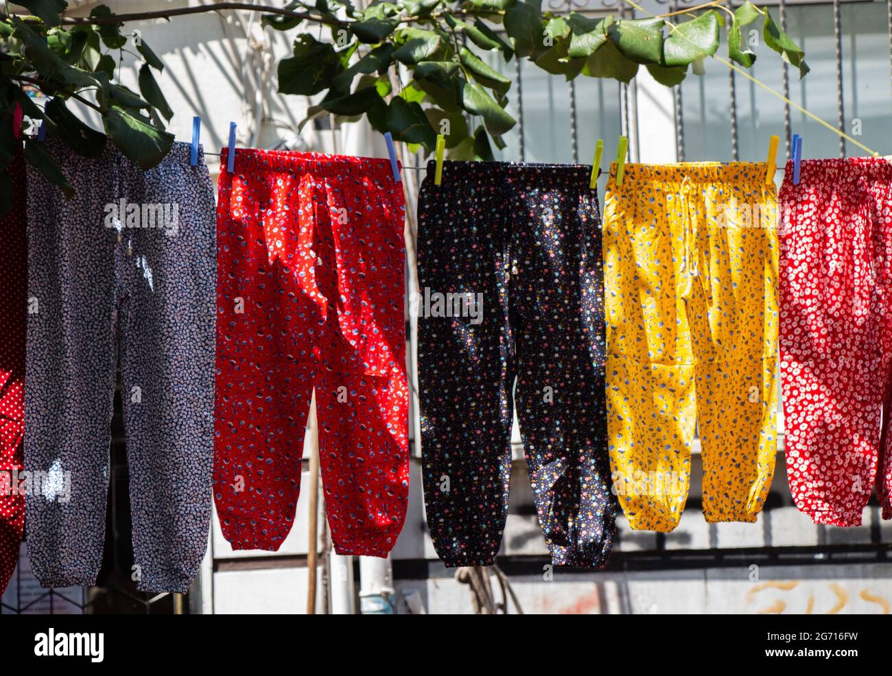 Closeup shot of pants hang on the rope Stock Photo - Alamy