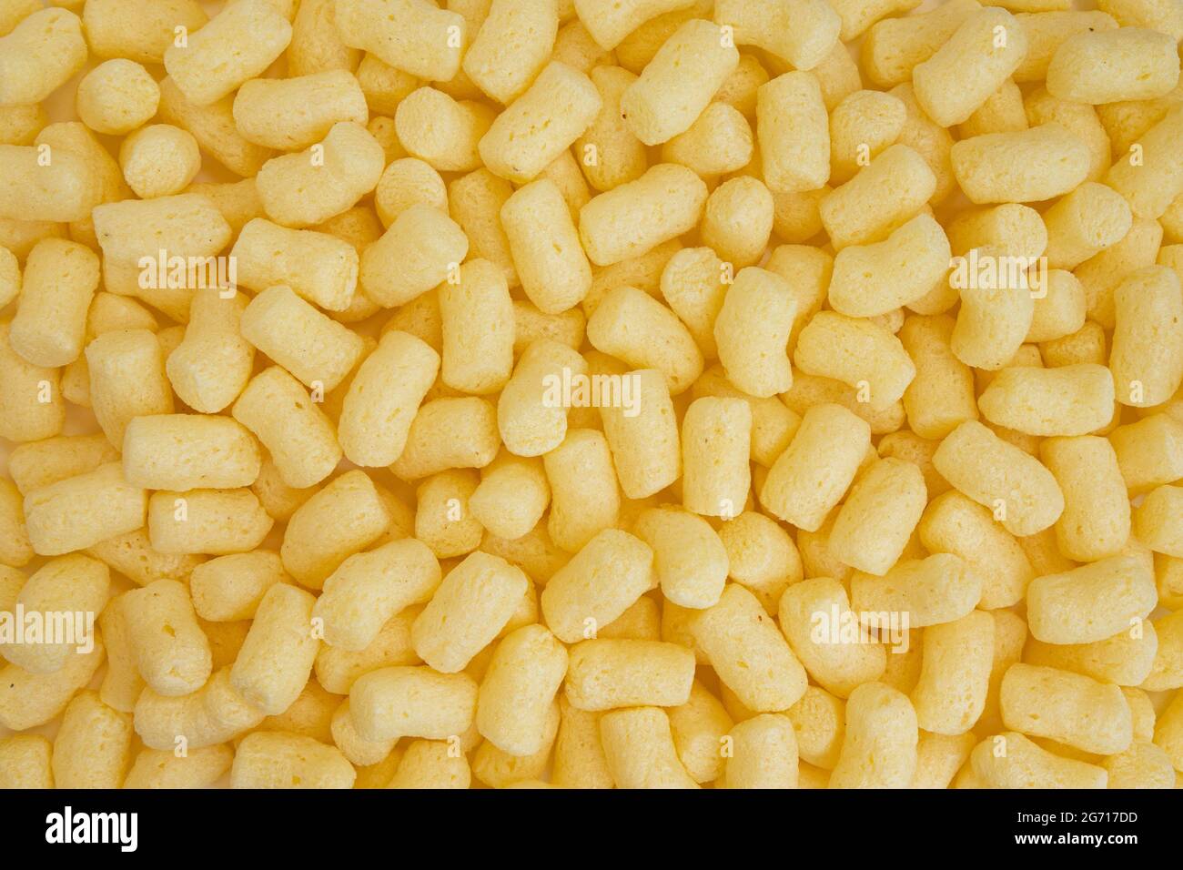 yellow sweet corn sticks background, corn sticks with powdered sugar ...