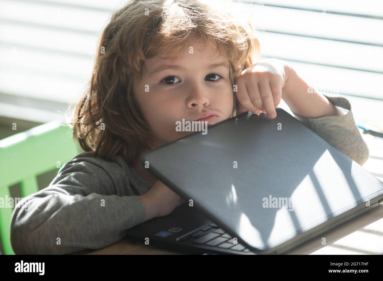 Sad kid with notebook. Hard to understand. Back to school. Thinking ...