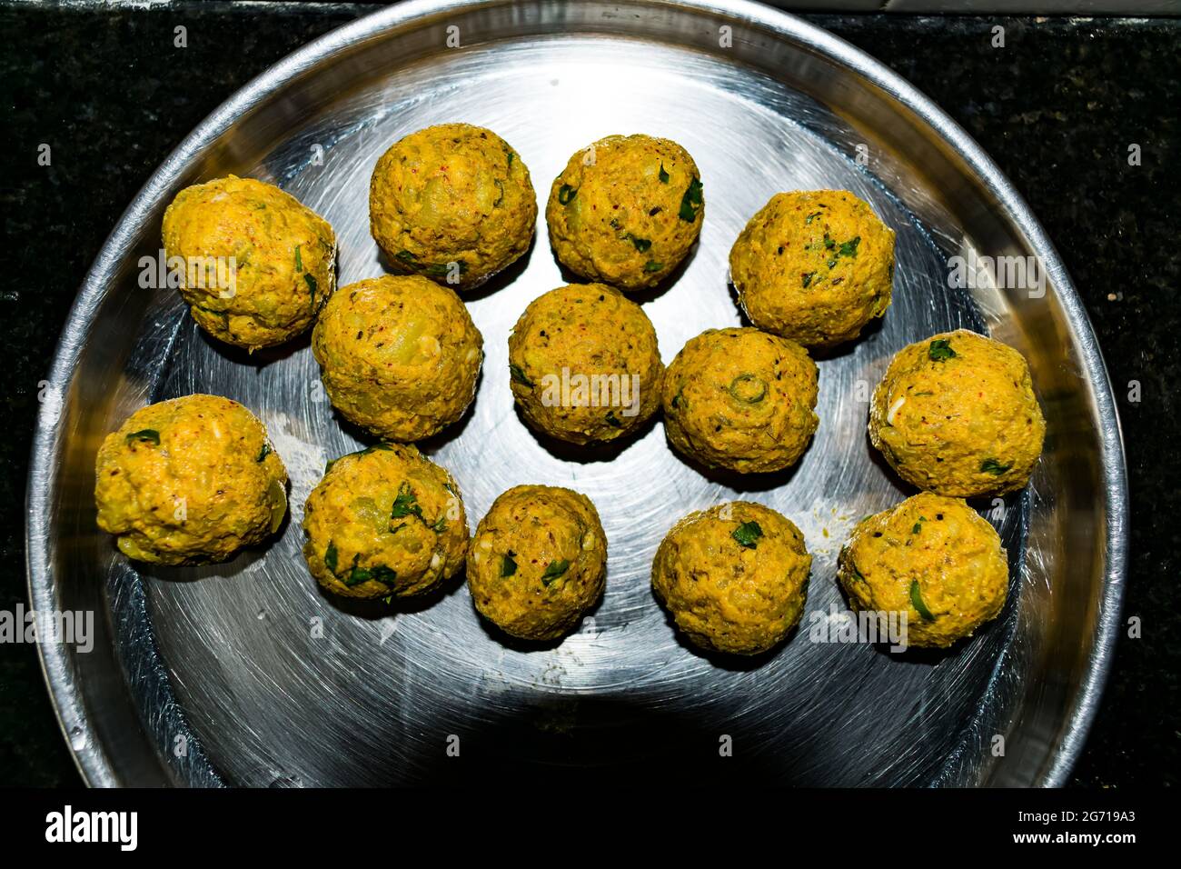 Vegetarian Kopta ready for frying kept on a plate after made in ...