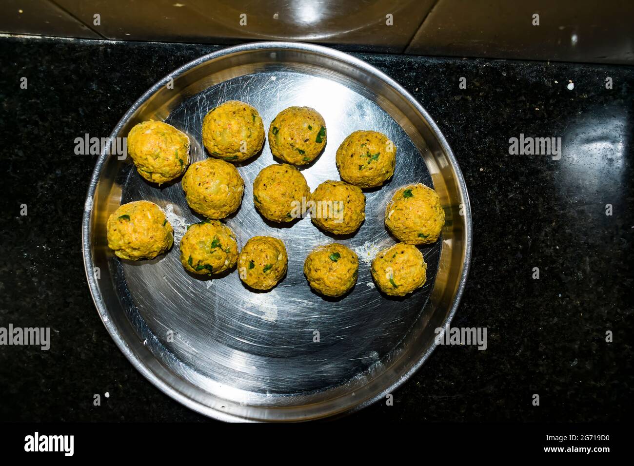 Vegetarian Kopta ready for frying kept on a plate after made in ...