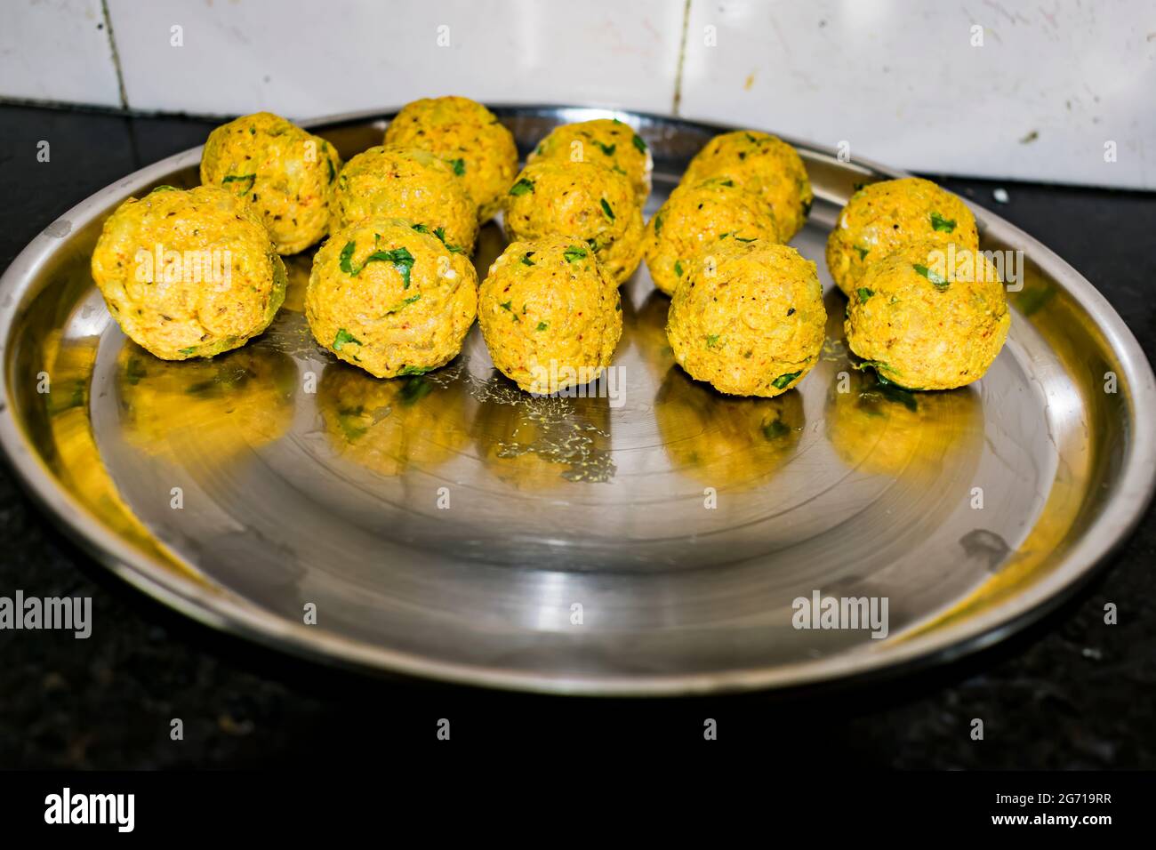 Vegetarian Kopta ready for frying kept on a plate after made in ...