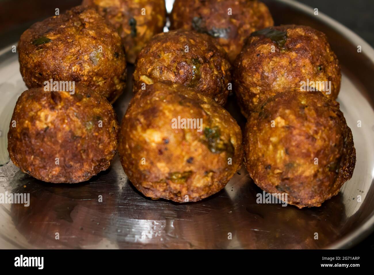 Vegetarian Kopta ready for frying kept on a plate after made in ...