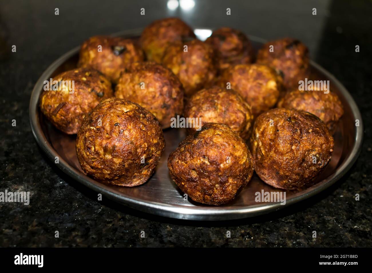 Vegetarian Kopta ready for frying kept on a plate after made in ...