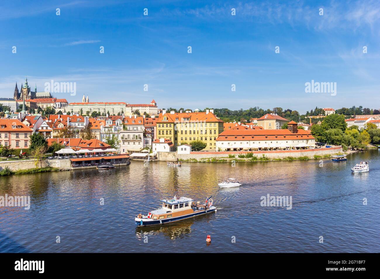 Boats on the river Moldau (Vltava) in historic city Prague, Czech ...