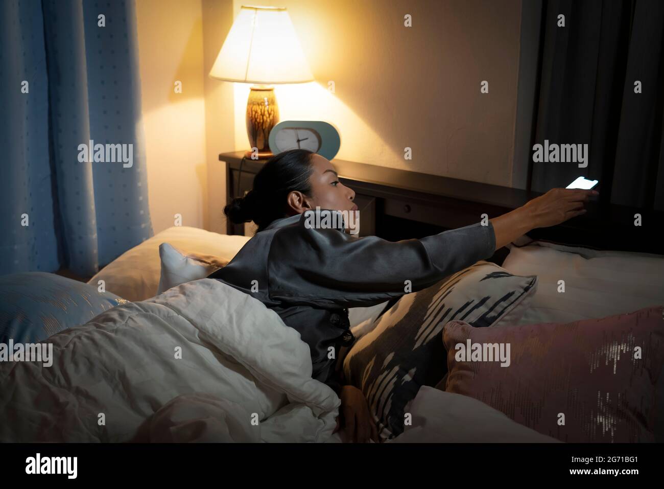 woman people in robe checking smart cellphone.Sad Depressed Insomnia ...