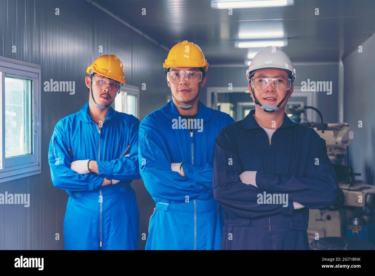Male industrial engineer or technician worker wear face mask with ...